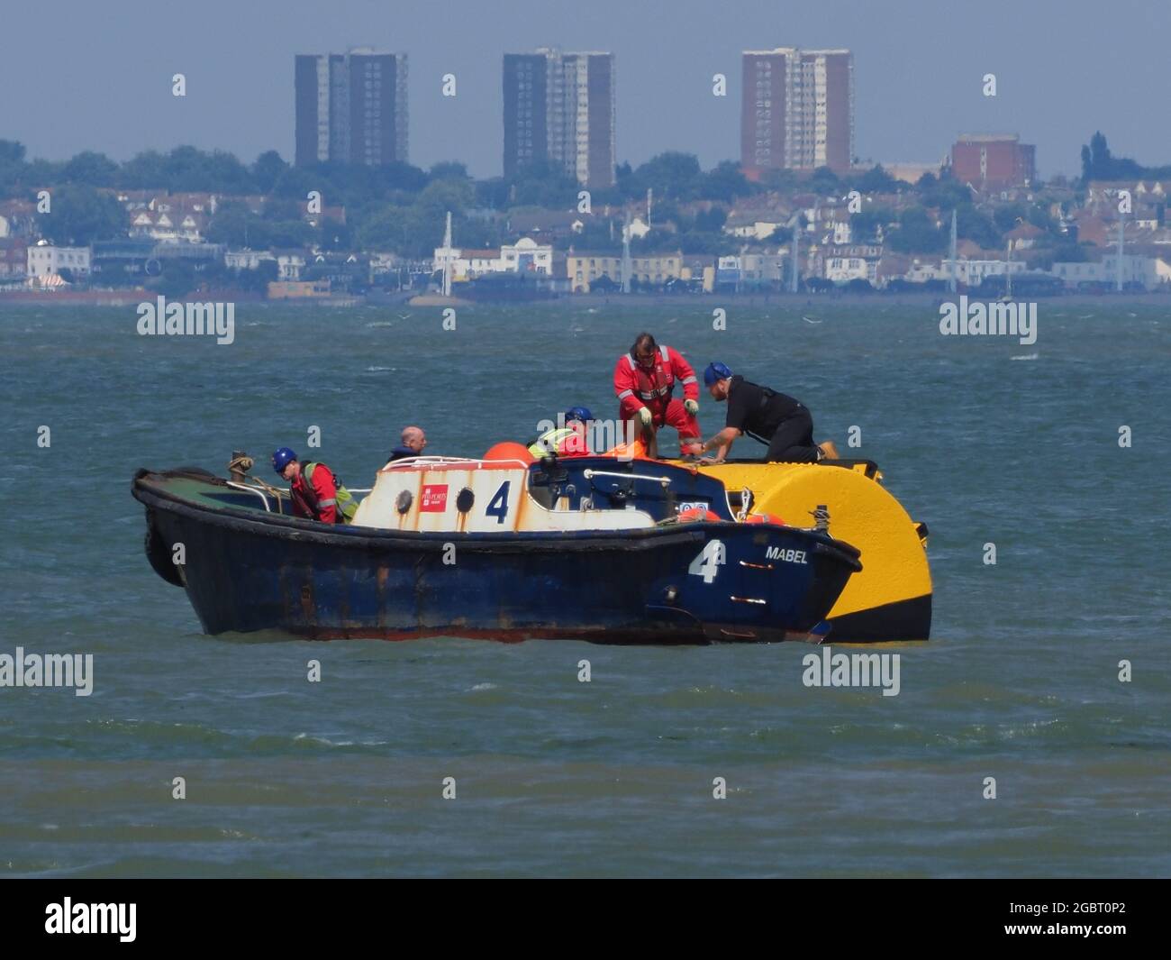 Sheerness, Kent, UK. 5th August, 2021. A mooring buoy being installed ...
