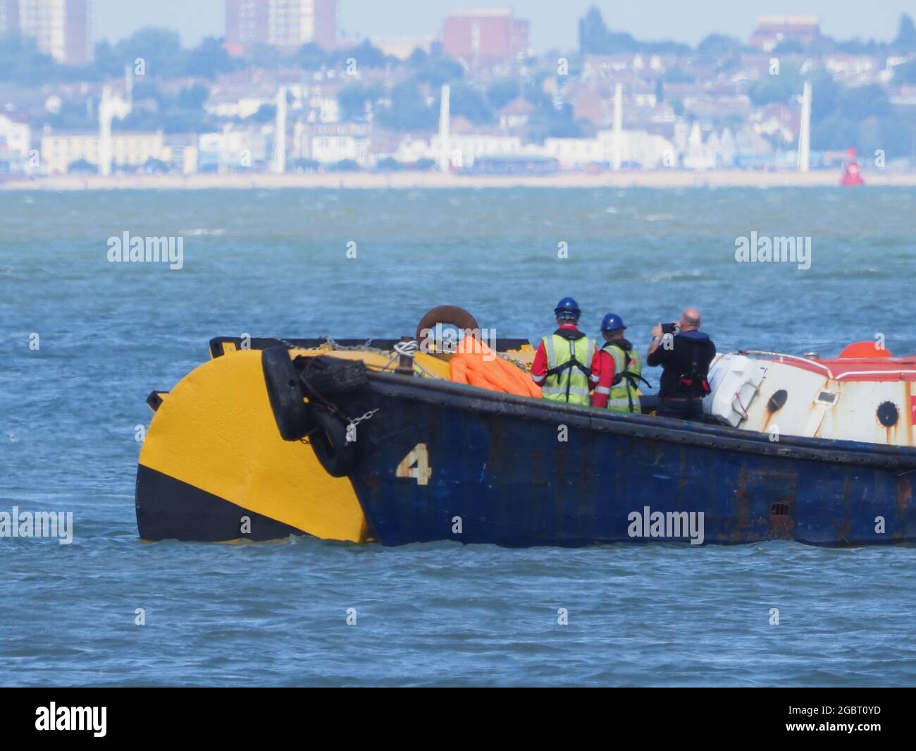 Sheerness, Kent, UK. 5th August, 2021. A mooring buoy being installed ...