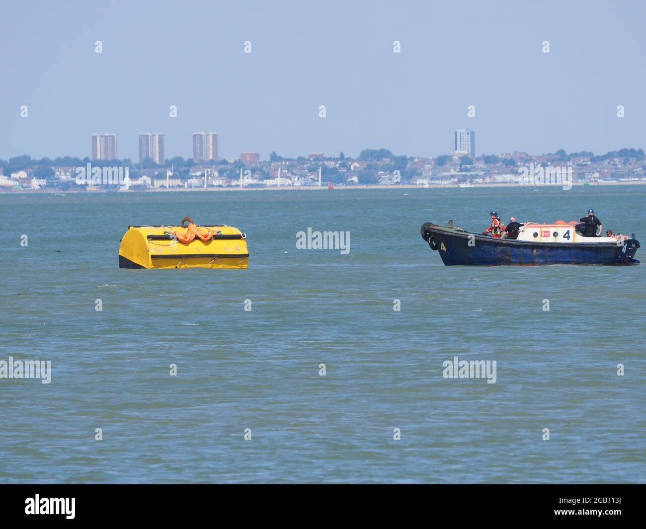 Sheerness, Kent, UK. 5th August, 2021. A mooring buoy being installed ...