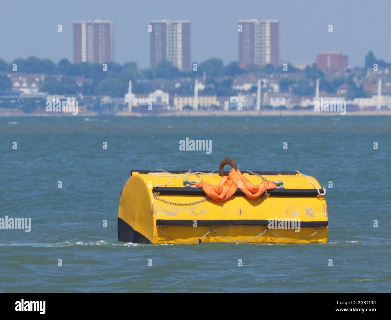 Sheerness, Kent, UK. 5th August, 2021. A mooring buoy being installed ...