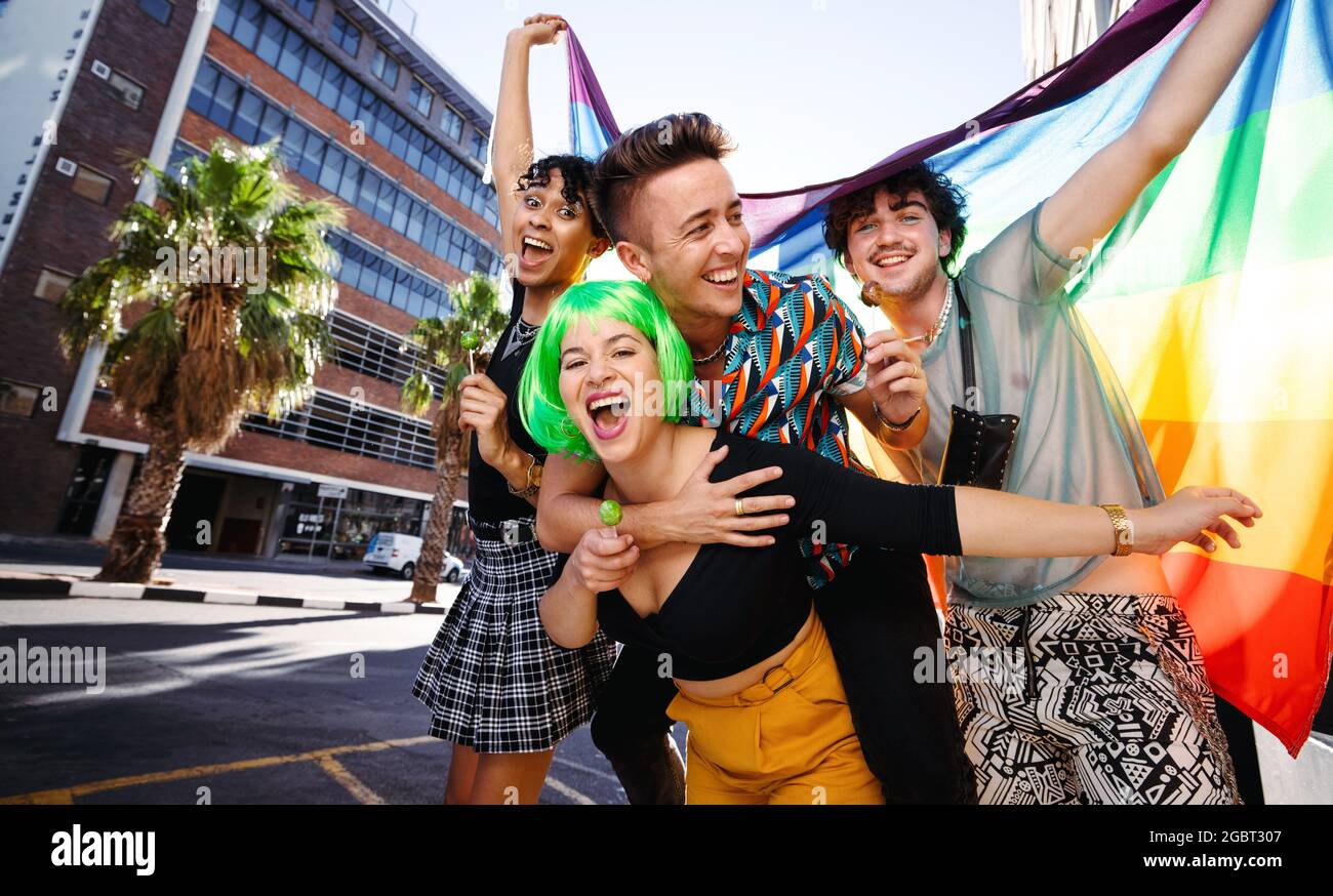 Gender non-conforming young people celebrating gay pride. Group of ...