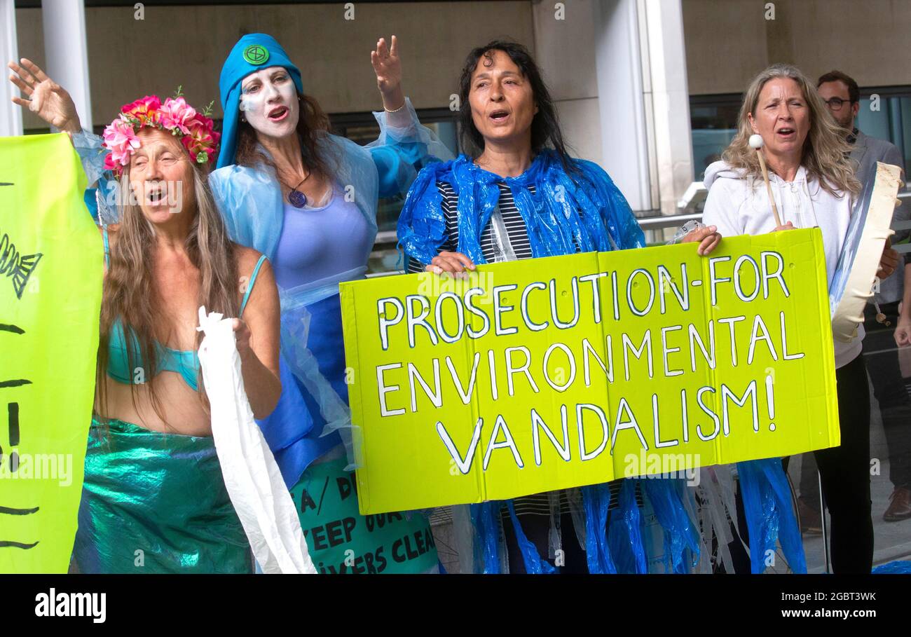 London, UK. 5th Aug, 2021. Members of Extinction Rebellion protest ...