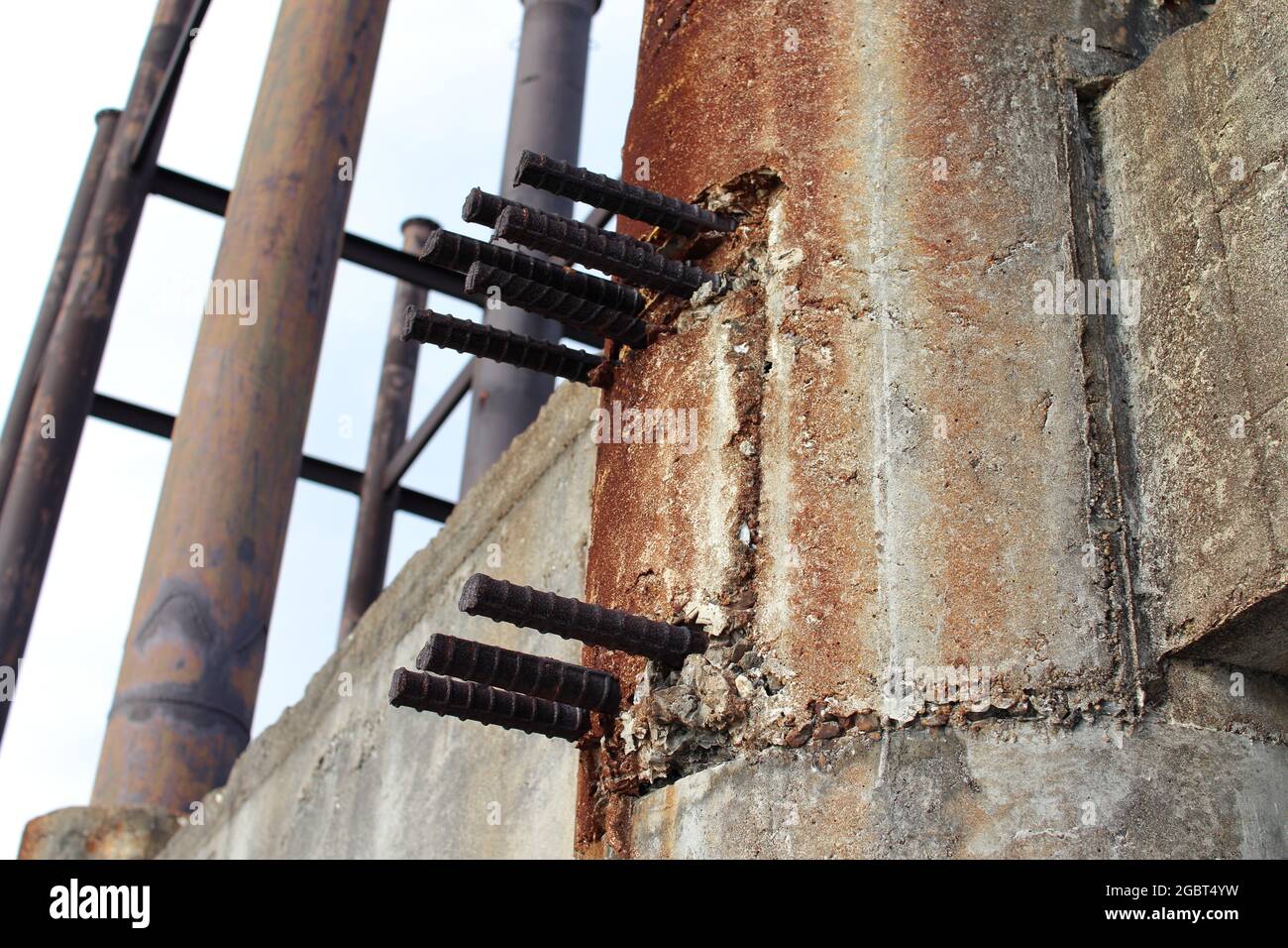 Static steel concrete beam with rusty screws Stock Photo - Alamy