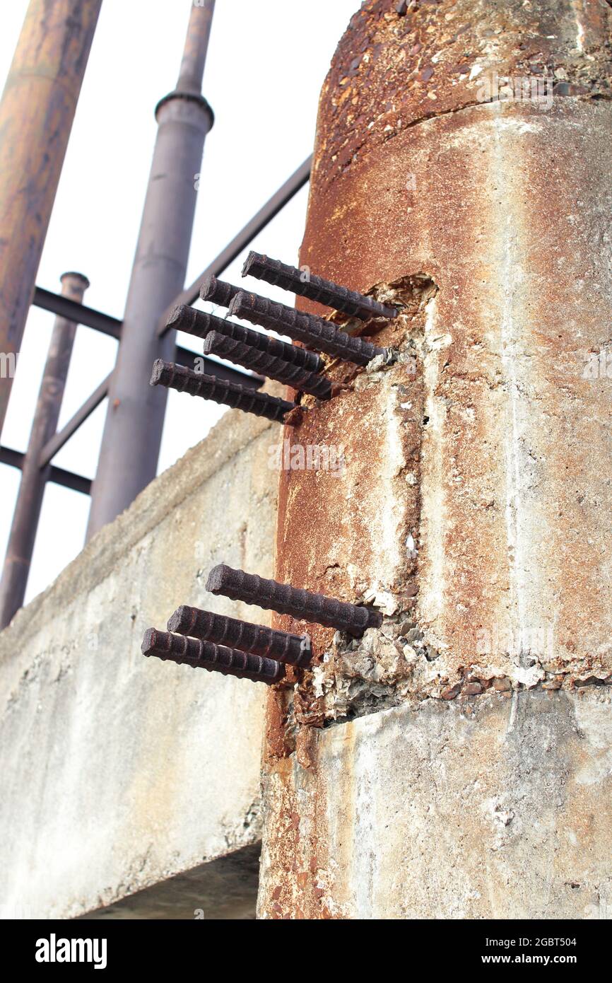 Static steel concrete beam with rusty screws Stock Photo - Alamy