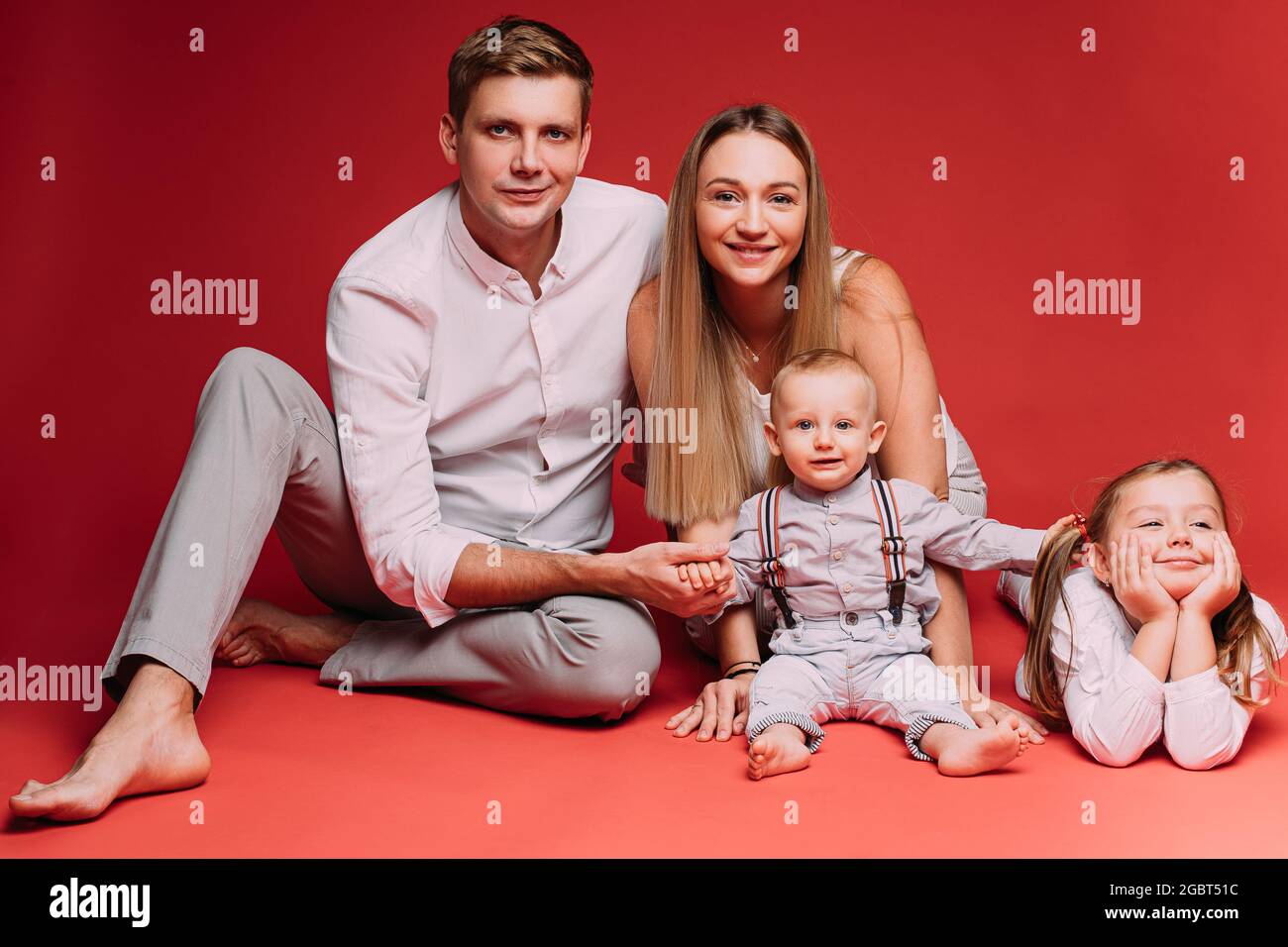Happy Caucasian family with two children Stock Photo - Alamy