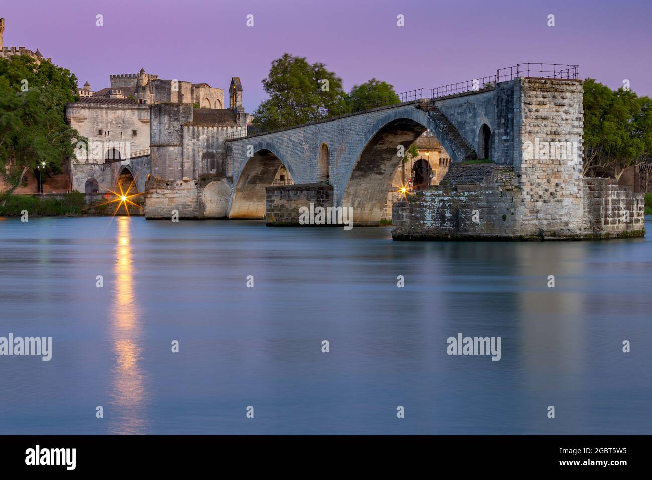 The famous bridge of Saint Benezet over the Rhone River at sunset ...