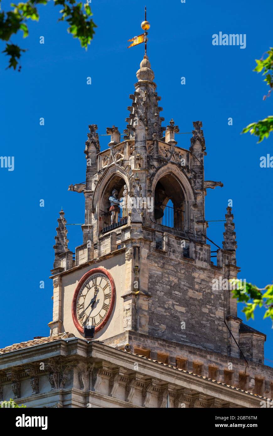 Old medieval stone clock tower in Avignon. France. Provence Stock Photo ...