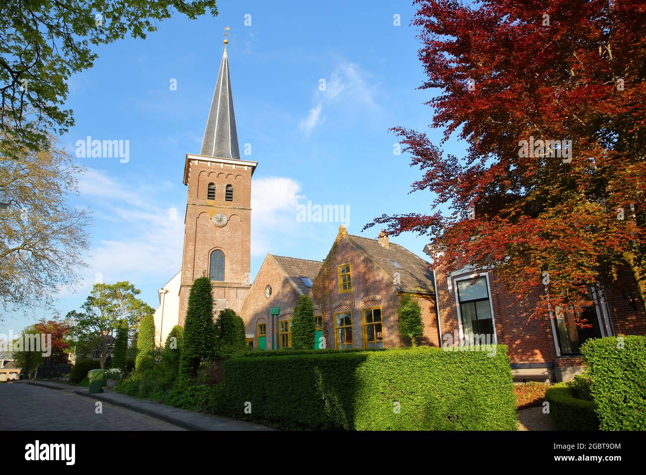 The Christian church and traditional houses in Mantgum, Friesland ...