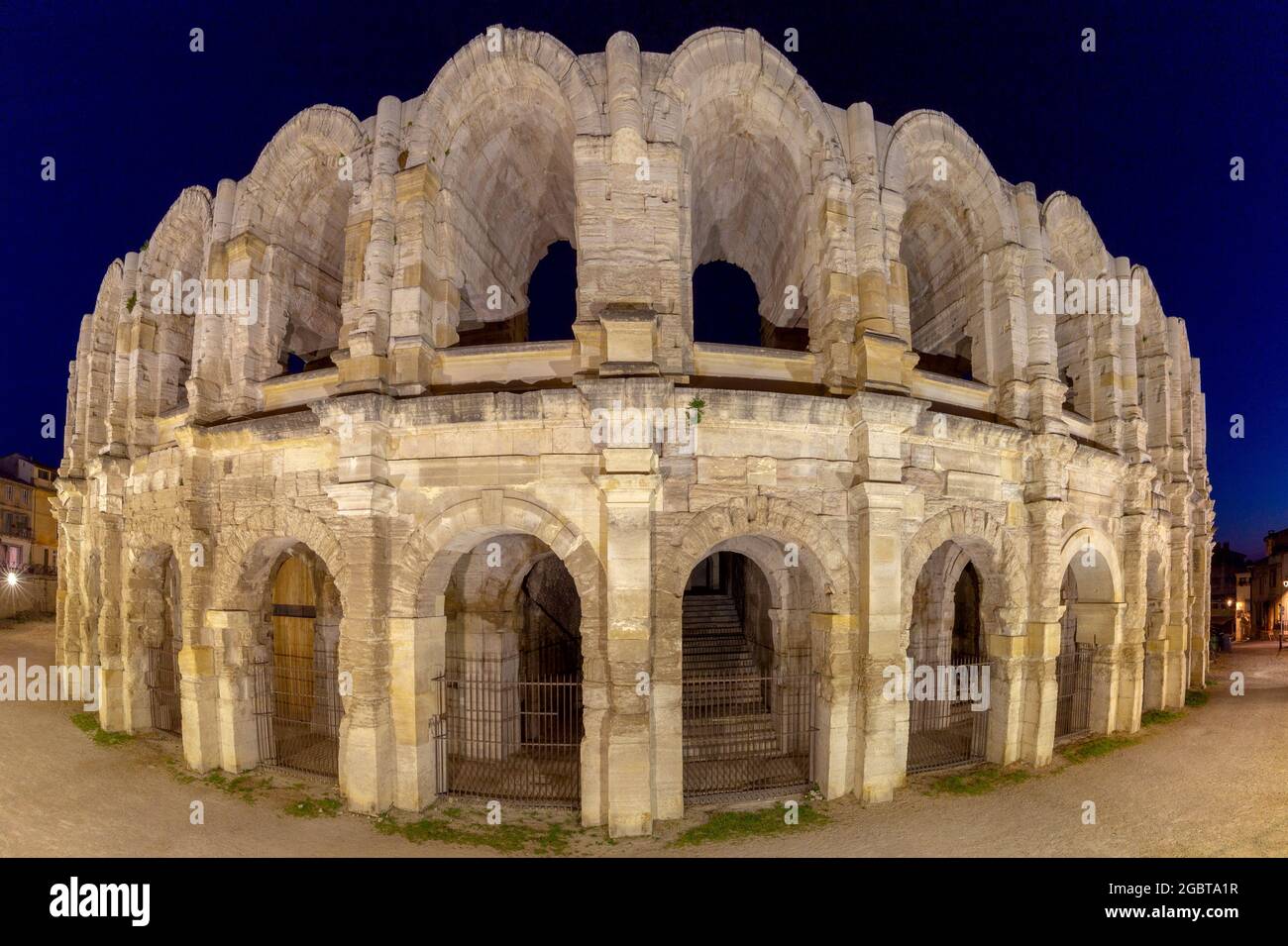 Panorama of the old antique roman amphitheater arena in night lighting ...