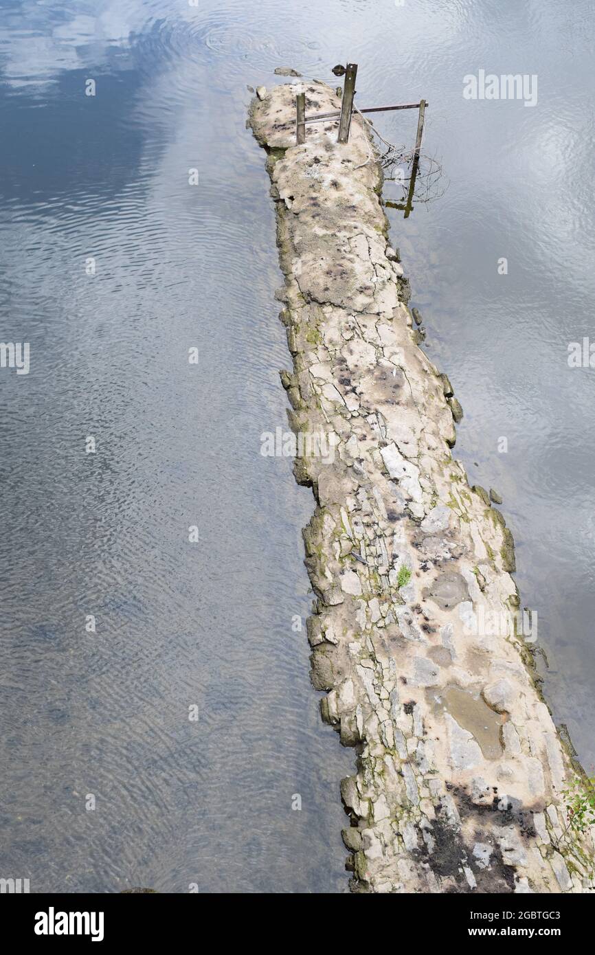 wave breaking stones in the Lahn Stock Photo - Alamy