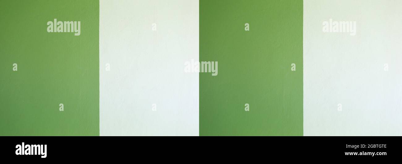 Wide cement wall painted green and cream color background for design in ...