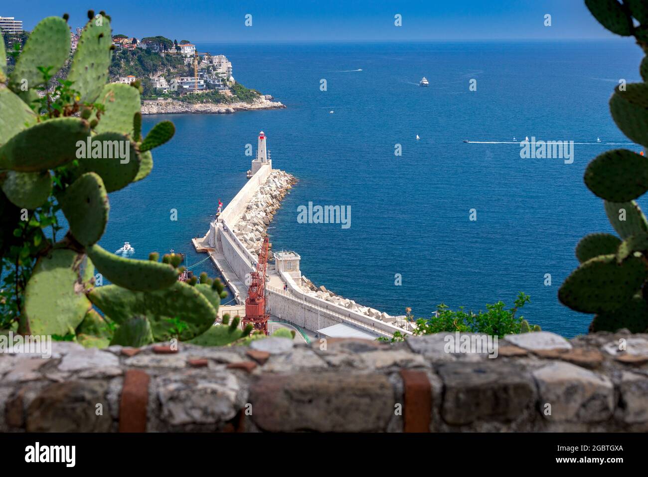 Aerial view of the lighthouse and breakwater in the port of Nice ...