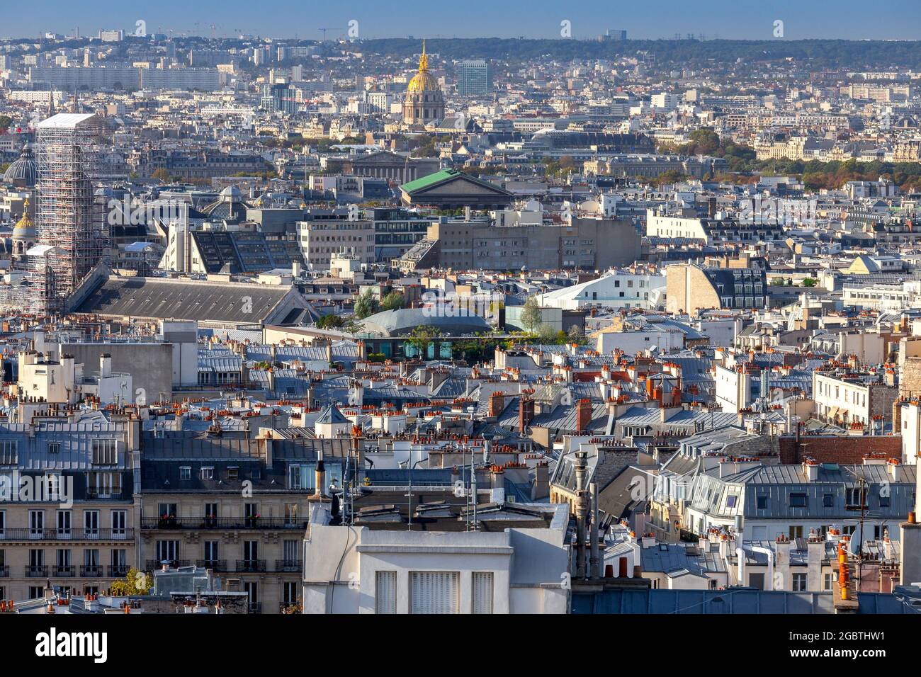 Picturesque aerial view of the city and the roofs in the early morning ...