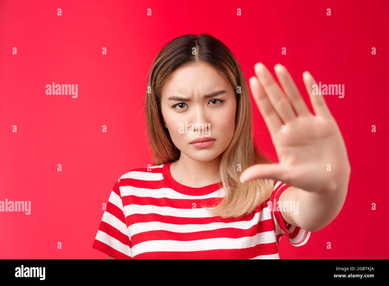 Serious Looking Alarmed Angry Asian Woman Pull Hand Forward Stop No