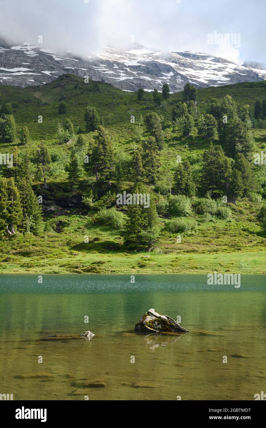 beautiful alpine lake Engstlensee in the Bernese Alps Stock Photo - Alamy