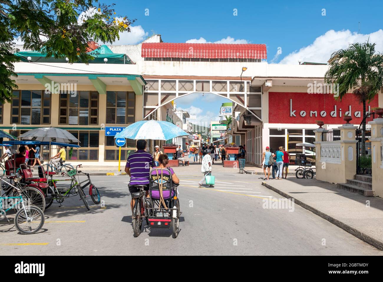 Bicitaxi Cuban people and lifestyle in the city, Holguin, Cuba Stock ...