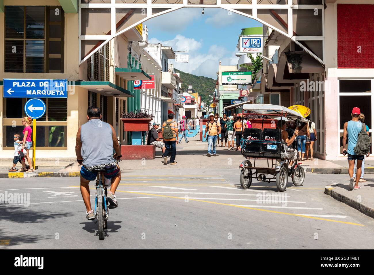 Bicitaxi Cuban people and lifestyle in the city, Holguin, Cuba Stock ...