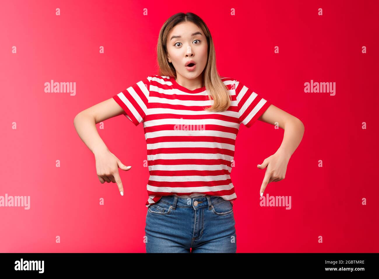 Wow look at that. Impressed interested asian blond female customer ...