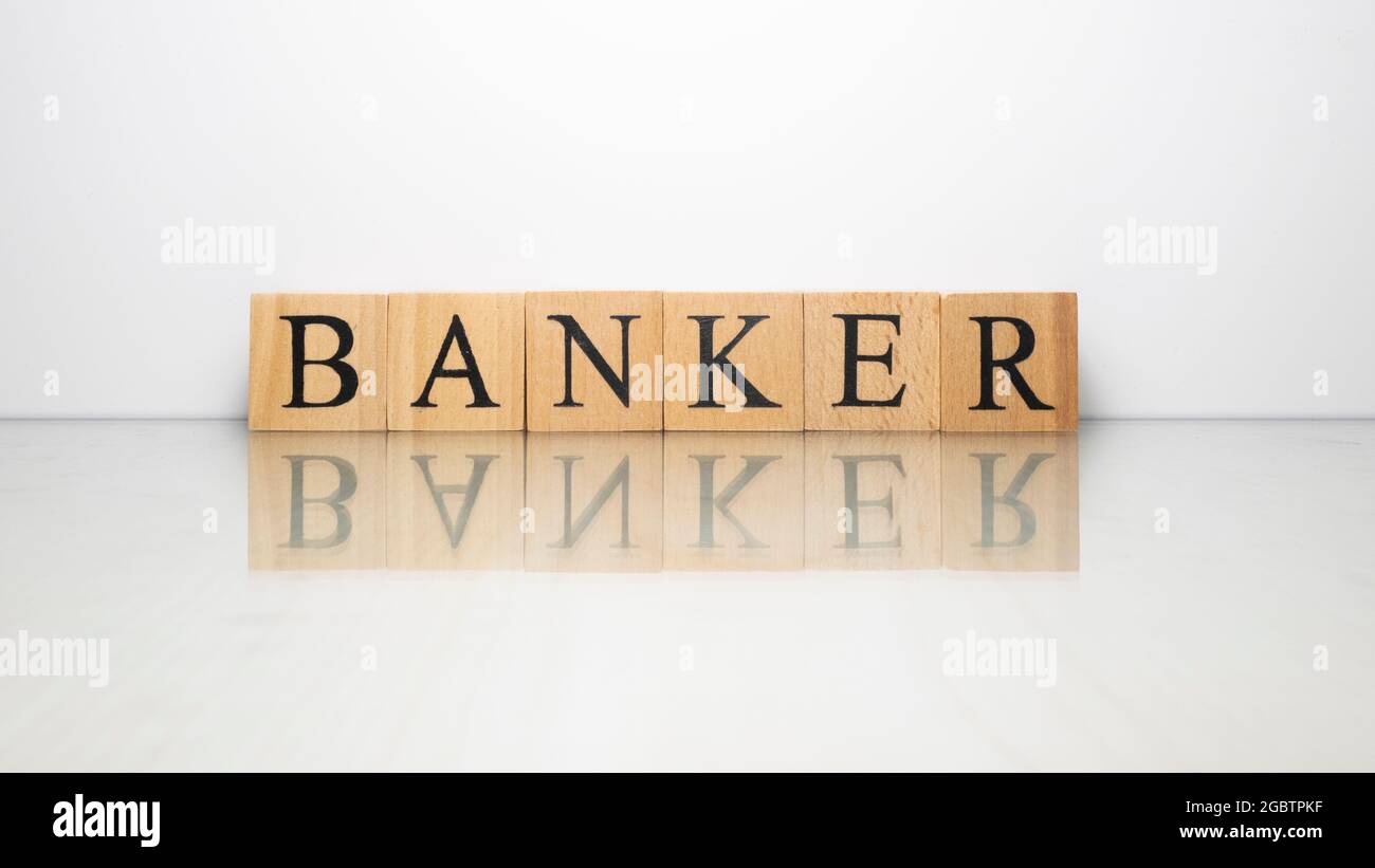 The name Banker was created from wooden letter cubes. finance and ...