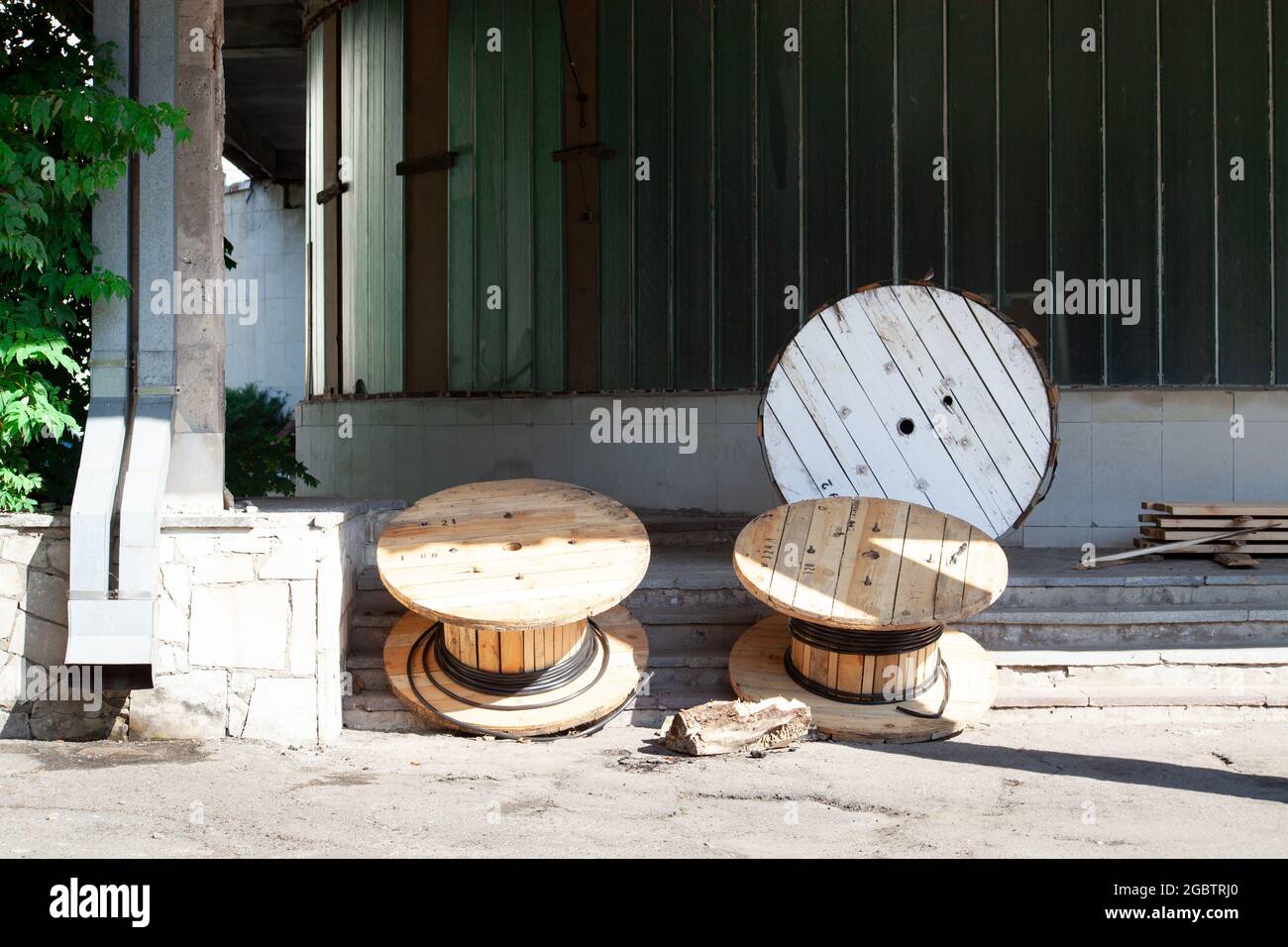 Large empty cable reels. nailed wood and plywood reels are used for a ...