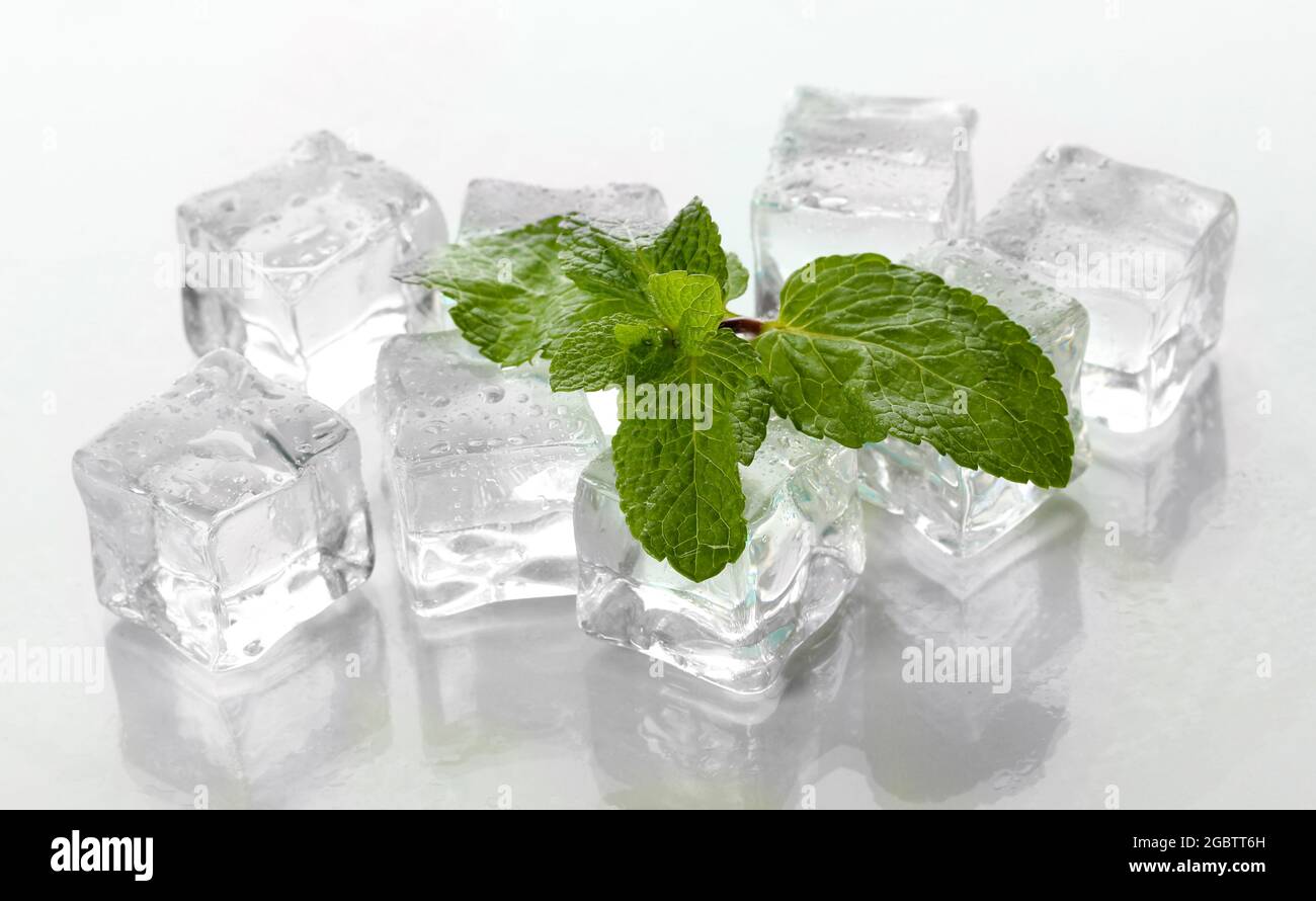 Ice with mint isolated on white Stock Photo - Alamy