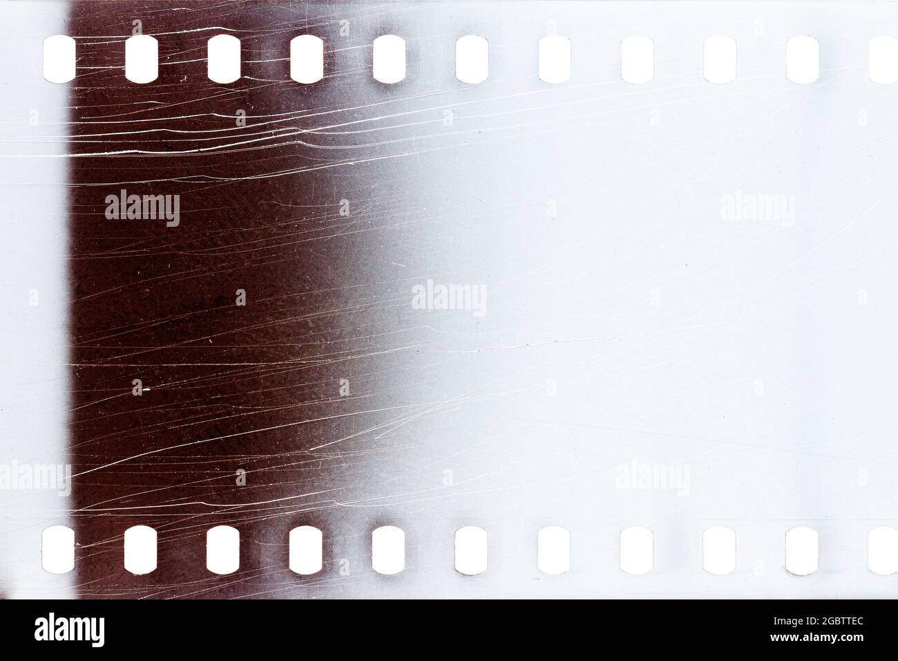 Dusty and grungy 35mm film texture or surface. Perforated camera film ...