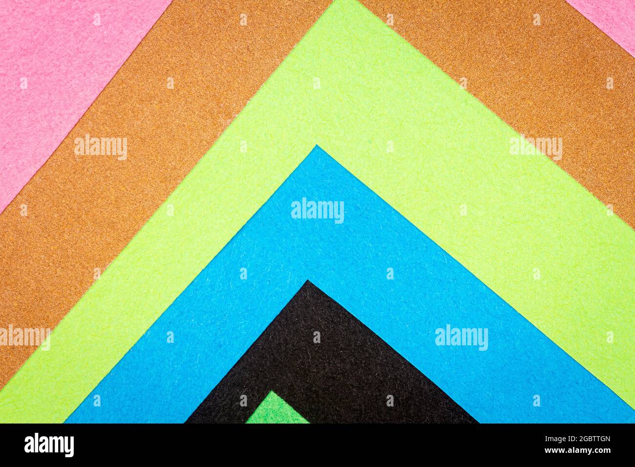 Multicolor background from a paper of different colors. Abstract ...