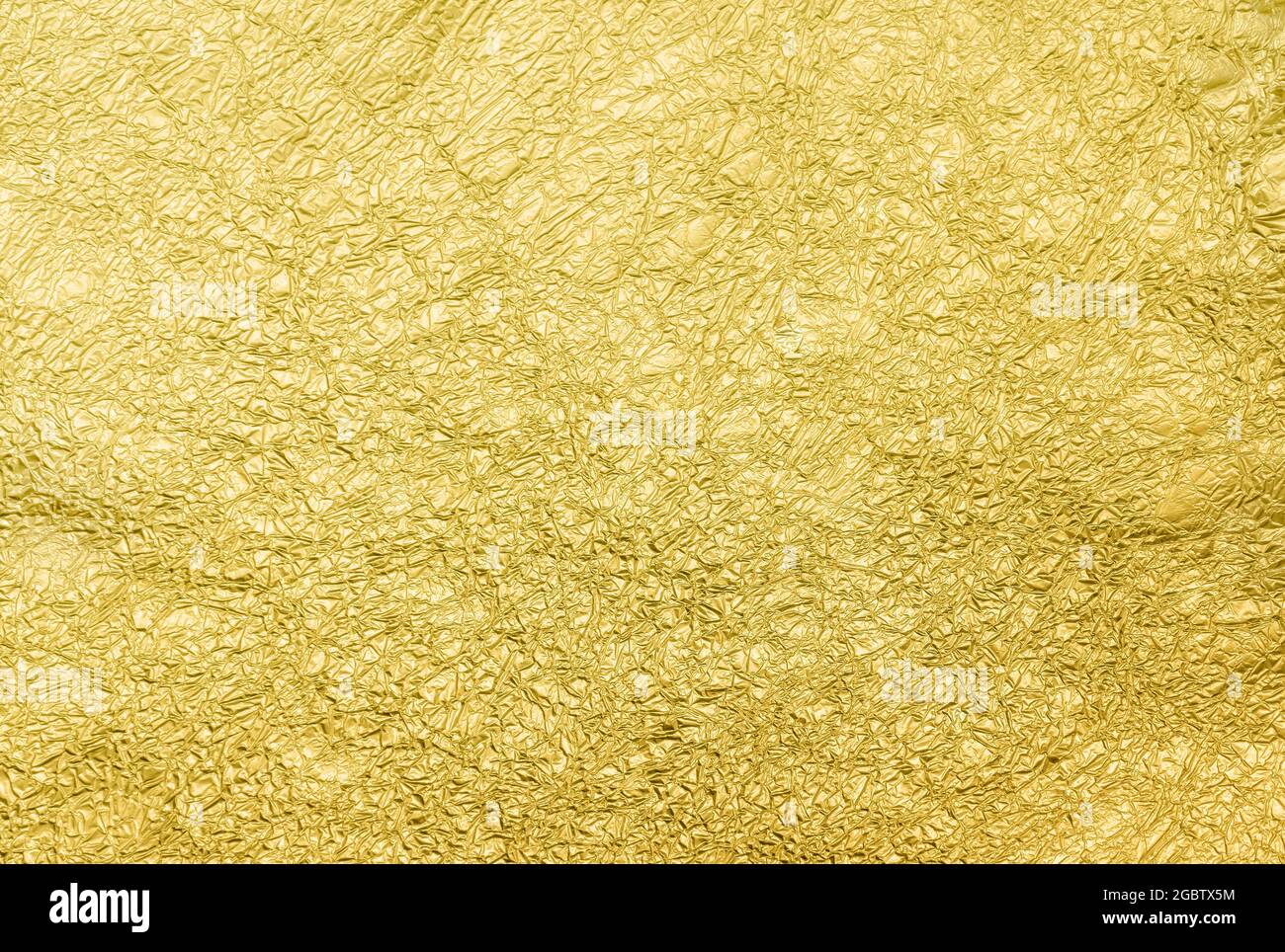 Gold foil metal decorative texture for background Stock Photo - Alamy