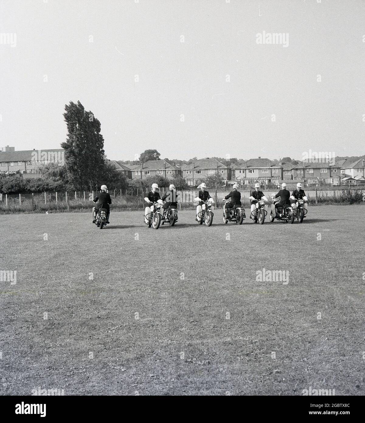 1969, historical, a motorcycle display team doing a demonstration at ...