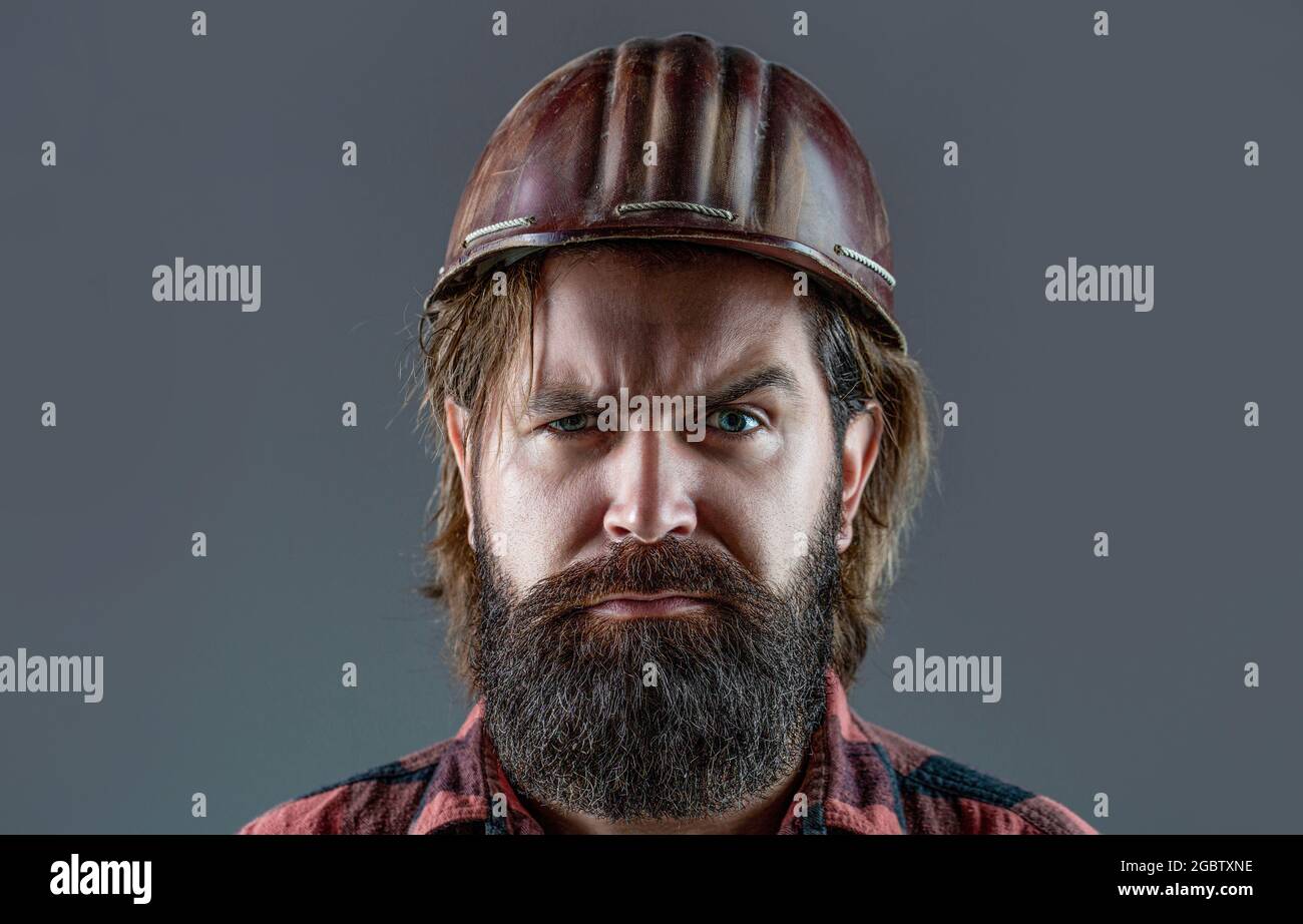 Builder in hard hat, foreman or repairman in the helmet. Building ...