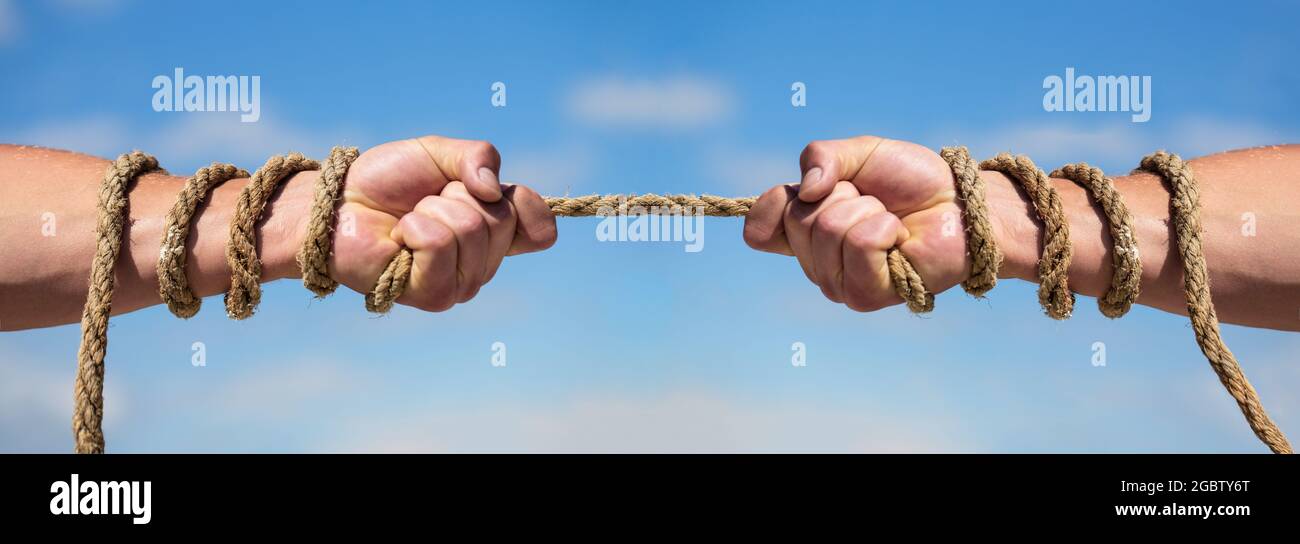 Two hands, helping hand, arm, friendship. Rope, cord. Hand holding a rope, climbing rope ...