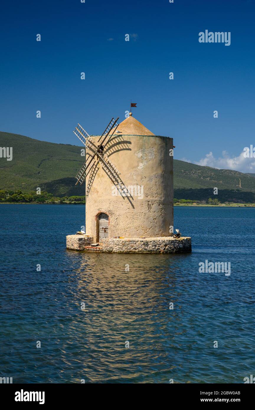 Ancient Spanish windmill in the lagoon of Orbetello, Tuscany Stock ...