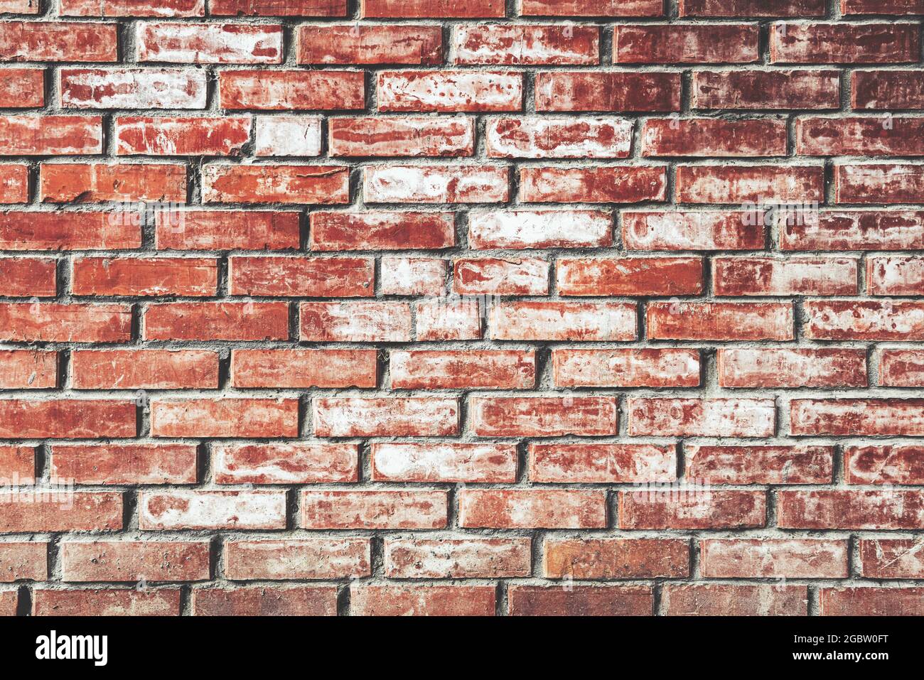 Weathered red brick wall background Stock Photo - Alamy