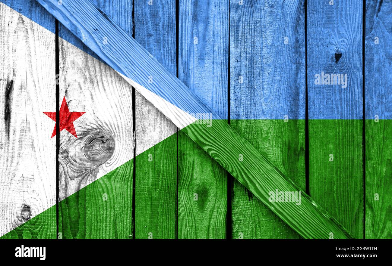 Djibouti flag is depicted on a wooden background close-up Stock Photo ...