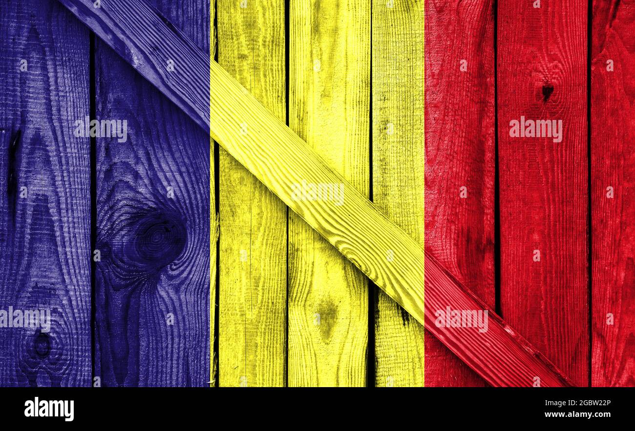 Romania flag is depicted on a wooden background close-up Stock Photo ...