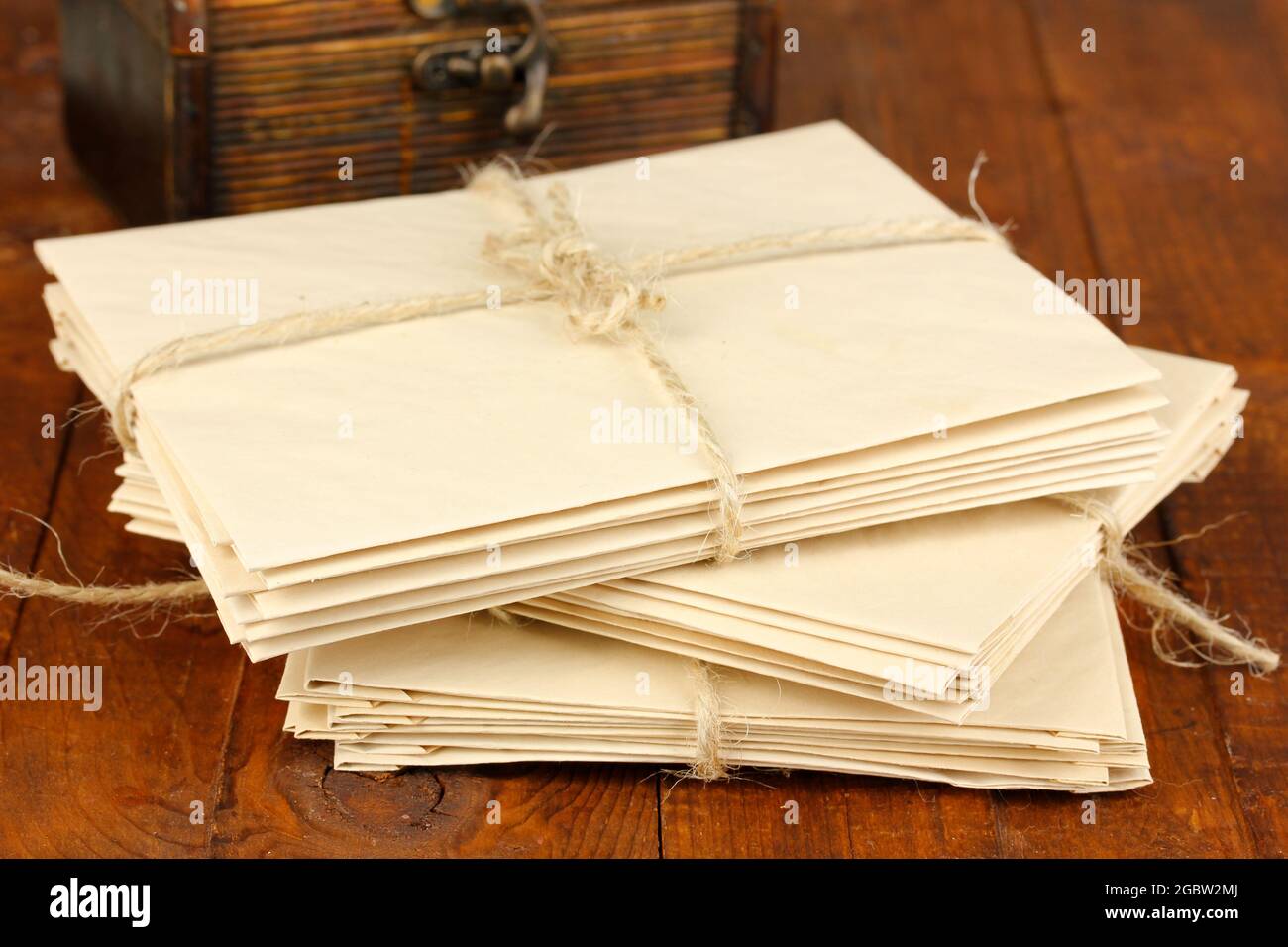 Stacks of old letters on wooden table Stock Photo - Alamy