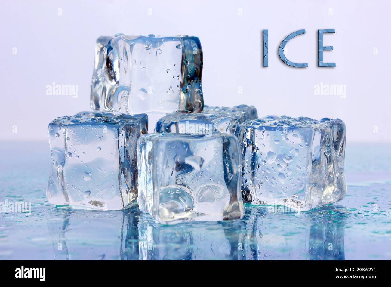Ice cubes on light background Stock Photo - Alamy