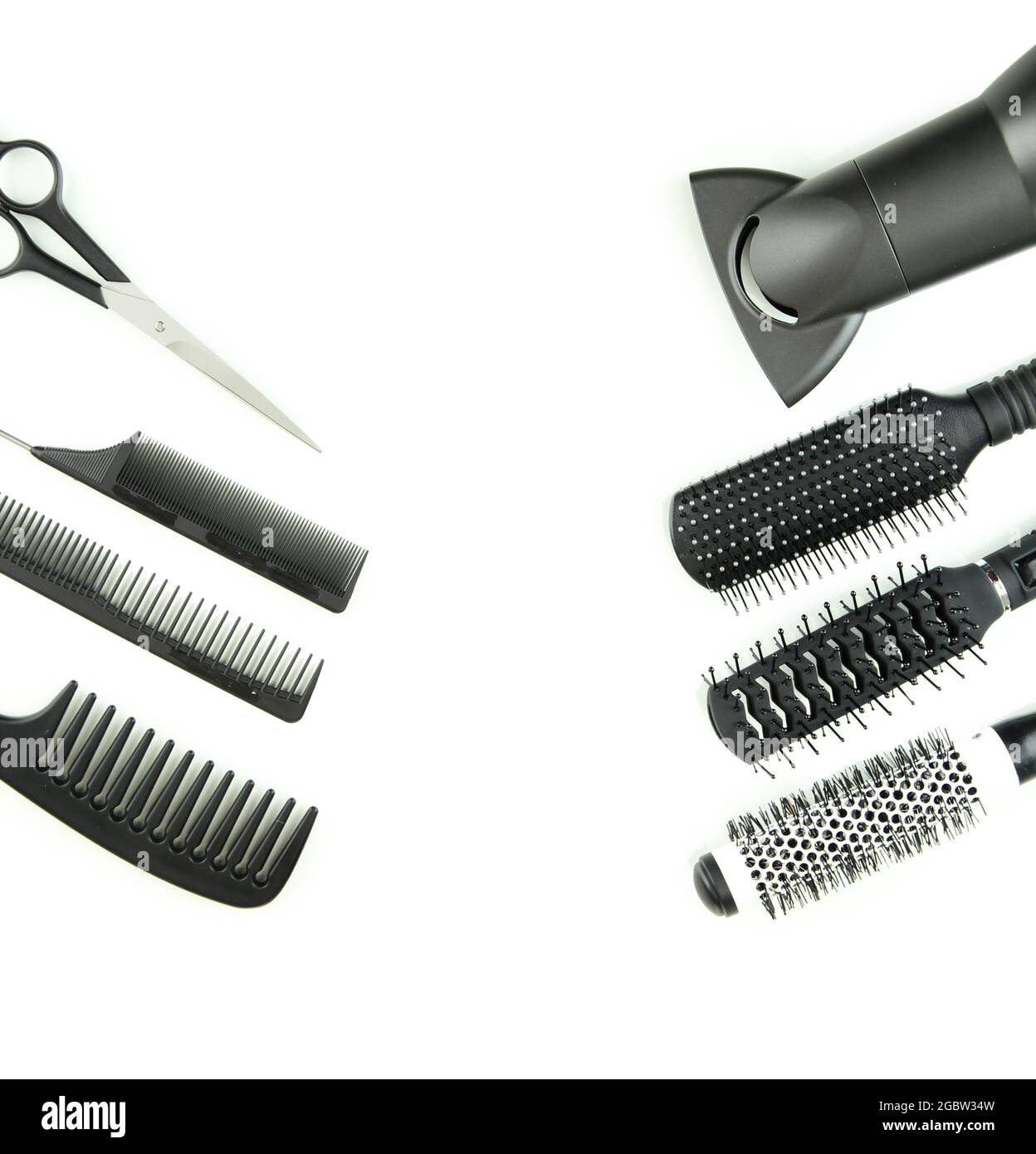 Comb brushes, hairdryer and cutting shears, isolated on white Stock ...