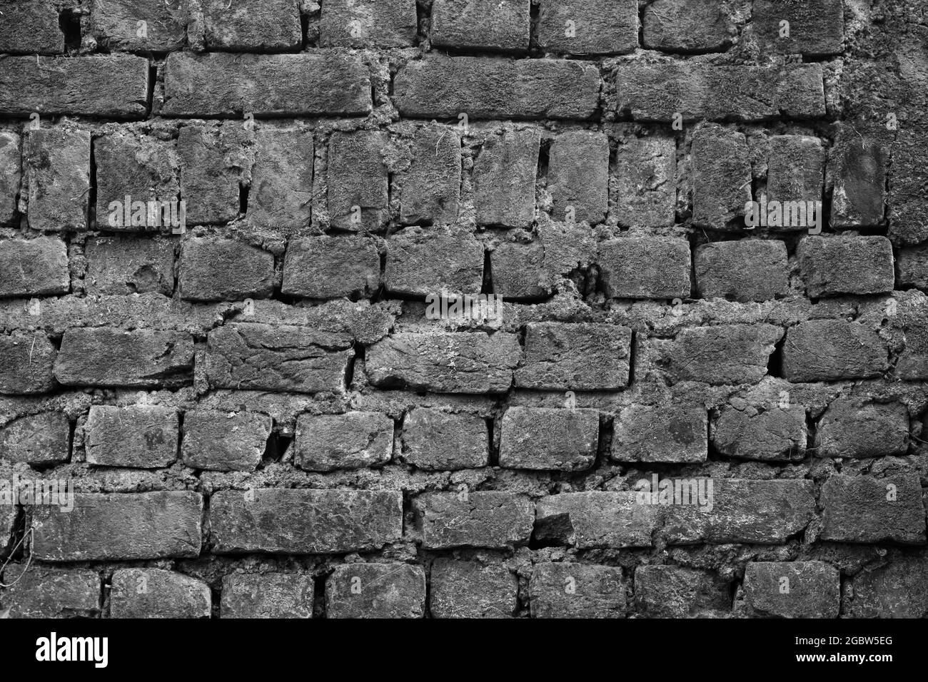 An old brick wall with patters as an Abstract in black and white Stock ...