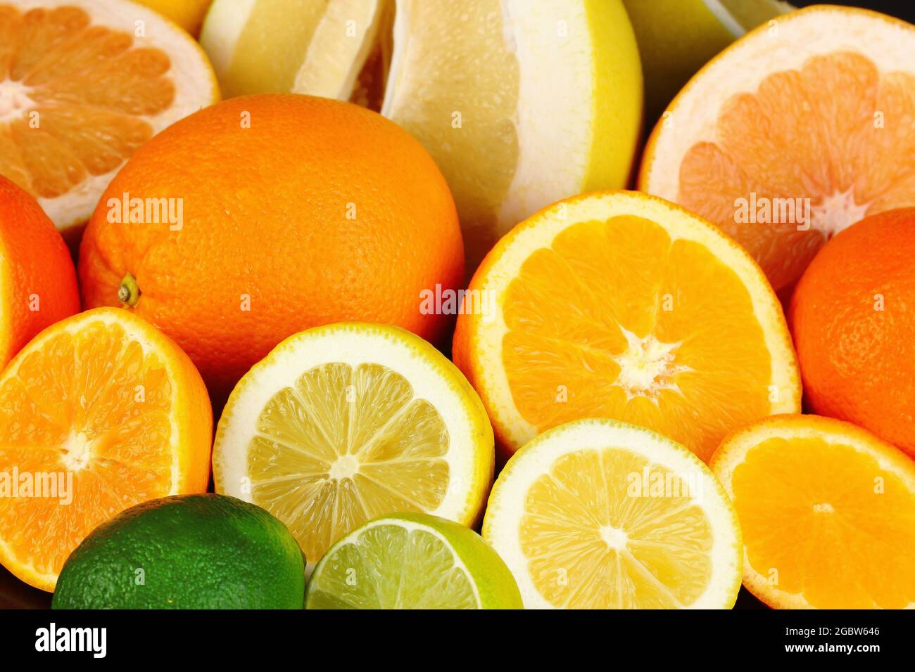 Lots ripe citrus close-up background Stock Photo - Alamy