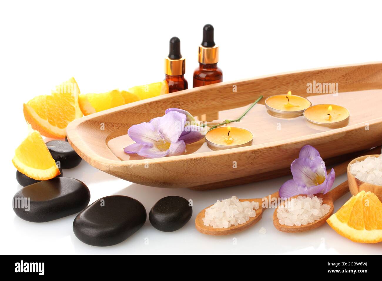 Beautiful spa setting with flowers and orange, isolated on white Stock ...