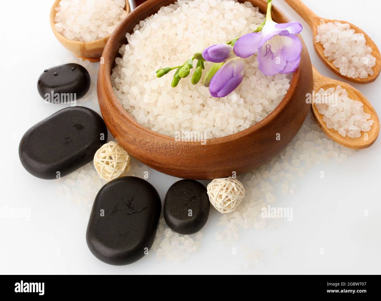 Beautiful spa setting with flowers, isolated on white Stock Photo - Alamy