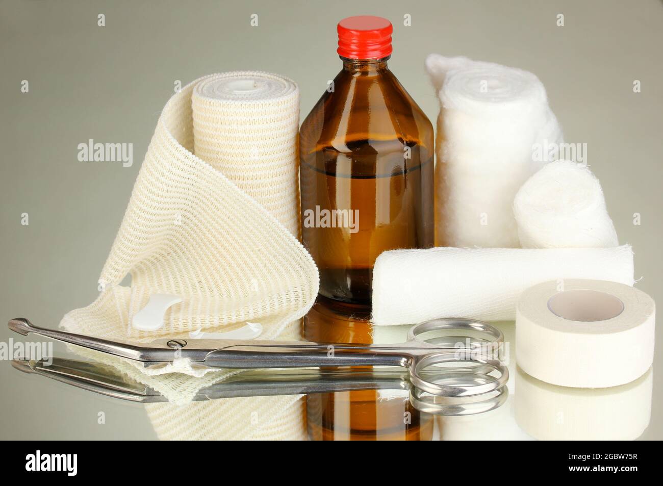 First aid kit for bandaging on grey background Stock Photo - Alamy