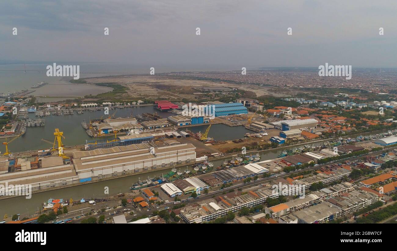aerial view cargo and passenger seaport with ships and crane Tanjung ...