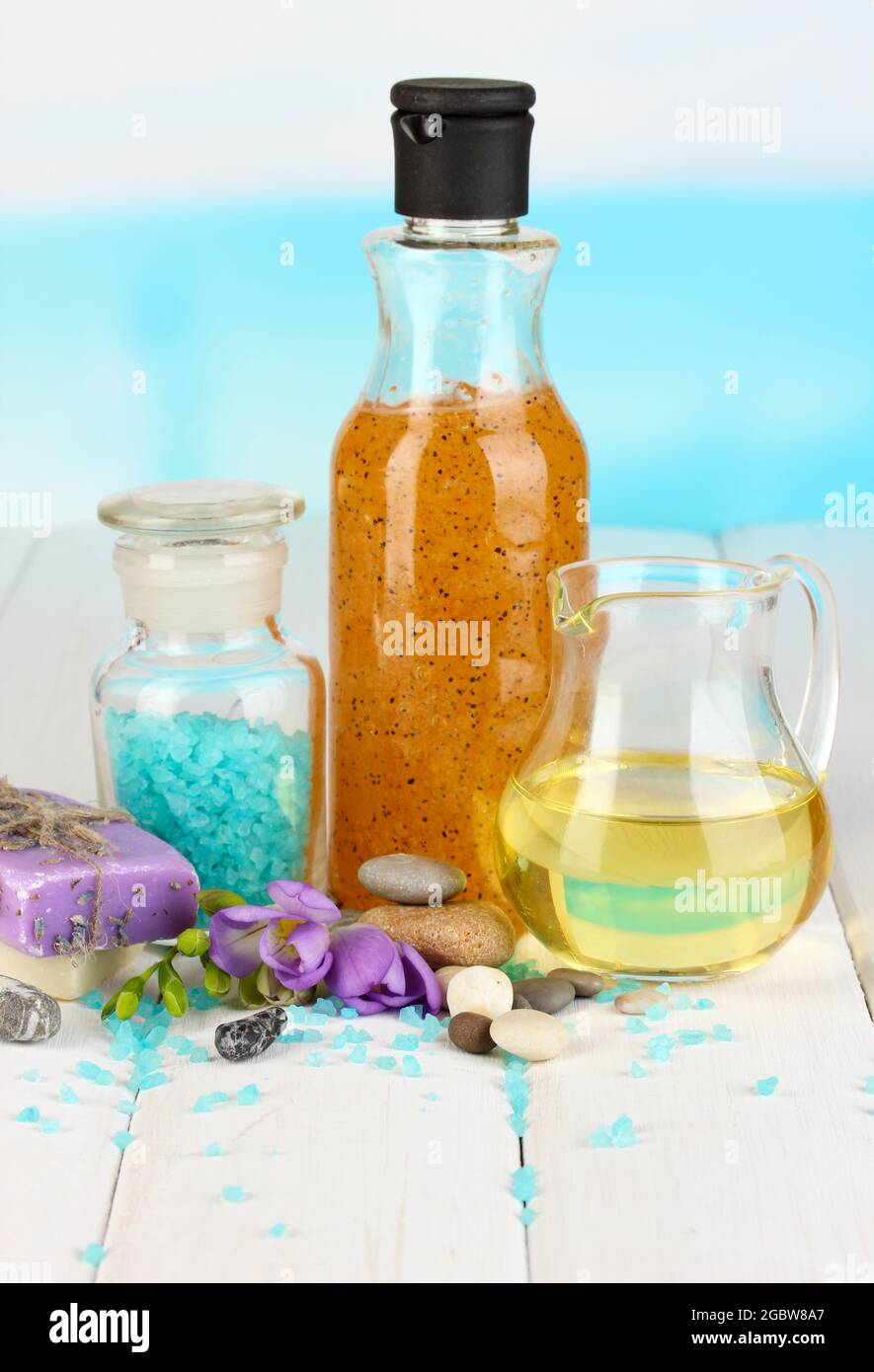 Beautiful spa setting on white wooden table on sky background Stock ...