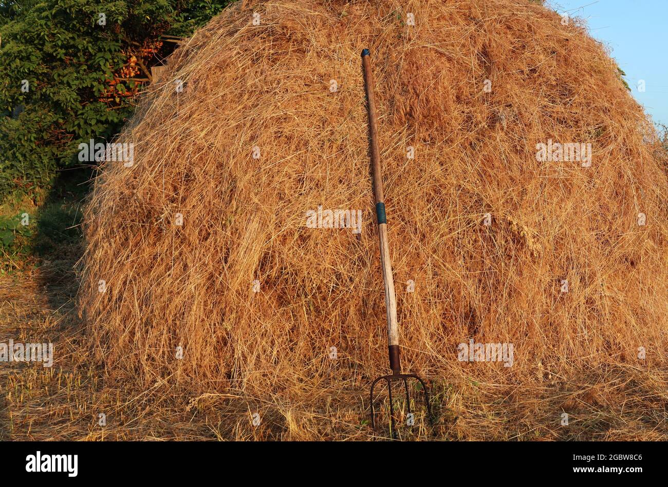 Beautiful summer season nature background with haystack. Rural backdrop ...