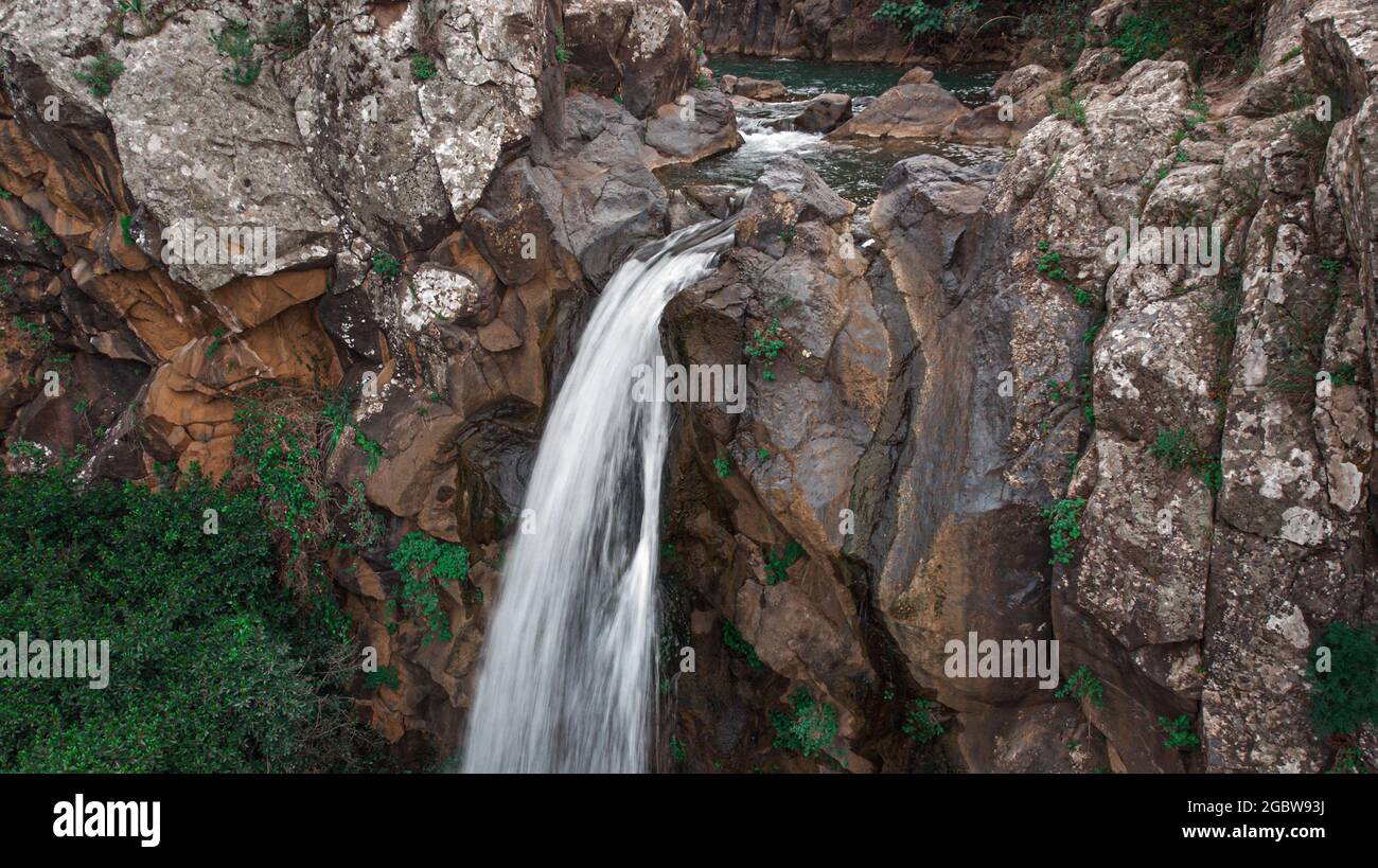 Mesmerizing view of a waterfall splashing in the rocks Stock Photo - Alamy