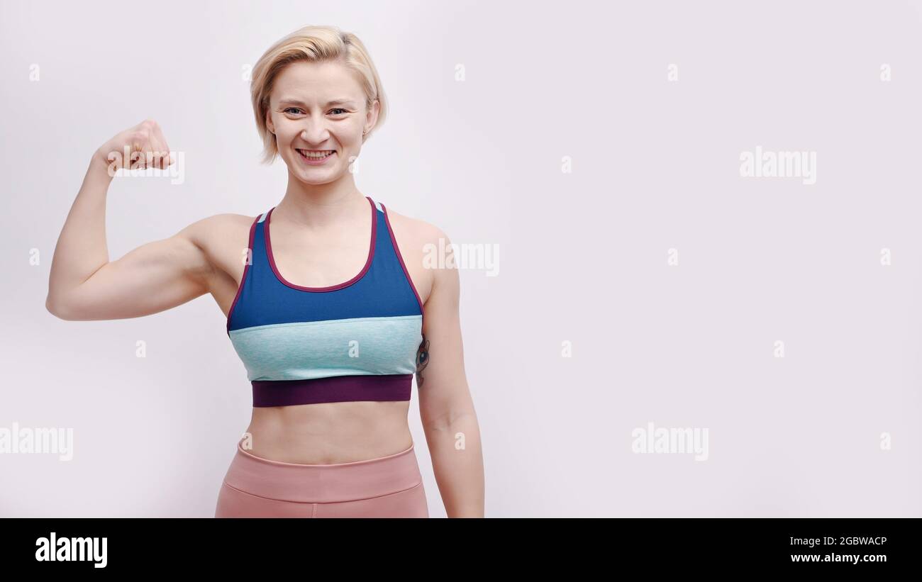 Female biceps isolated over white hi-res stock photography and images ...