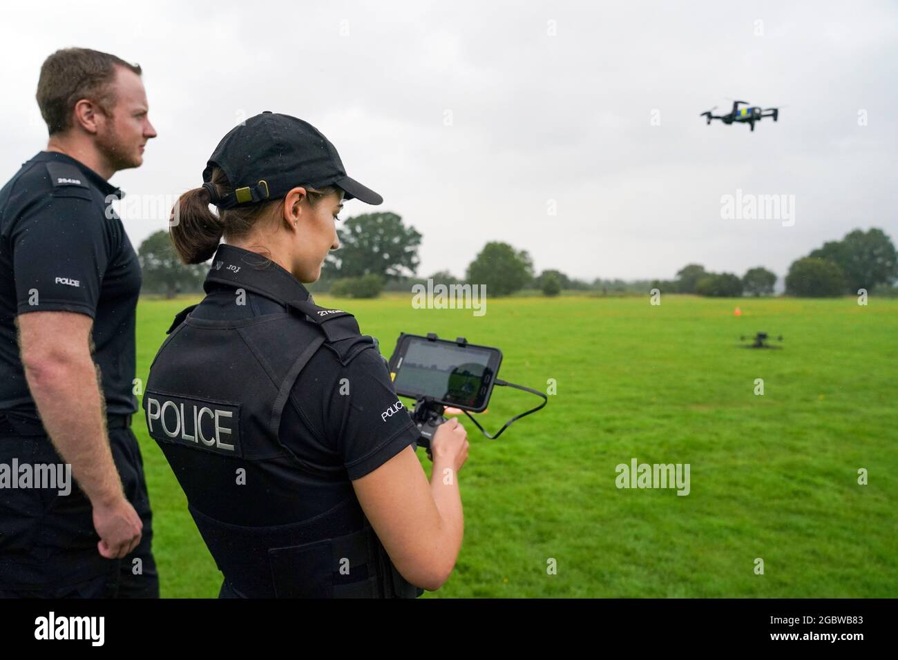 Police officers fly drones during the Thames Valley Police's first ...