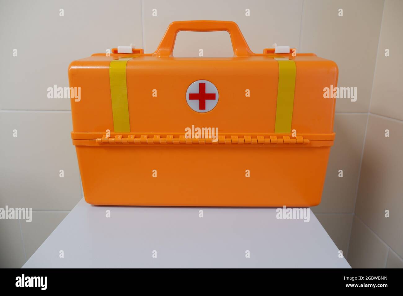Red suitcase white cross hi-res stock photography and images - Alamy